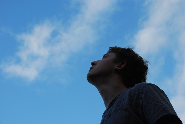 Student looks to the sky